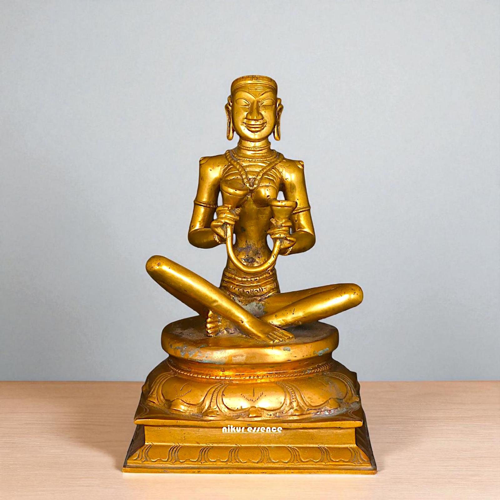 Karaikal Ammaiyar seated Panchaloha idol - 10 inches – Nikur Essence